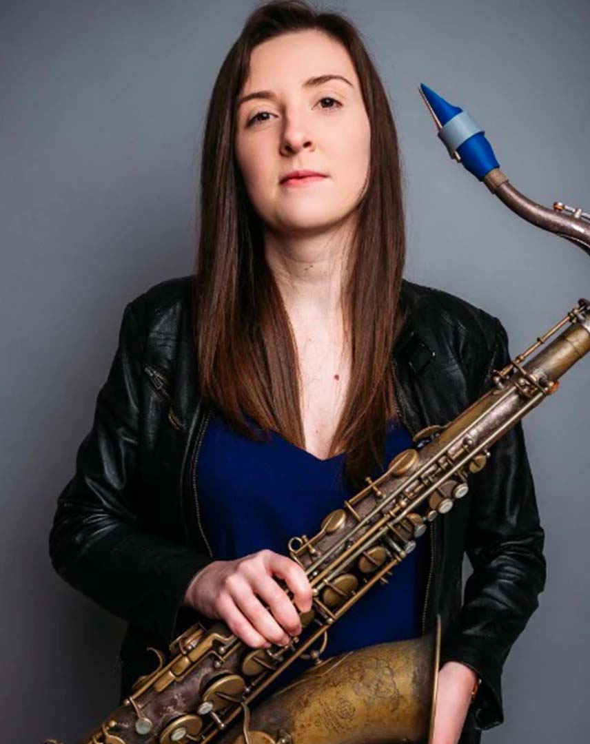 Emma Johnson plays Syos on her tenor saxophone