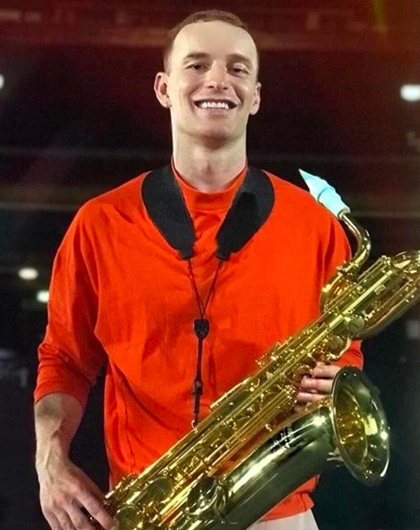 Tom Leaper plays a Syos mouthpiece on his baritone saxophone